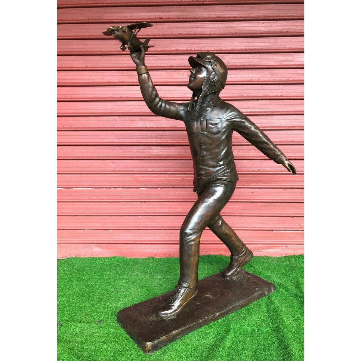 Bronze Statue of a Boy Flying a Plane | Randolph Rose Collection