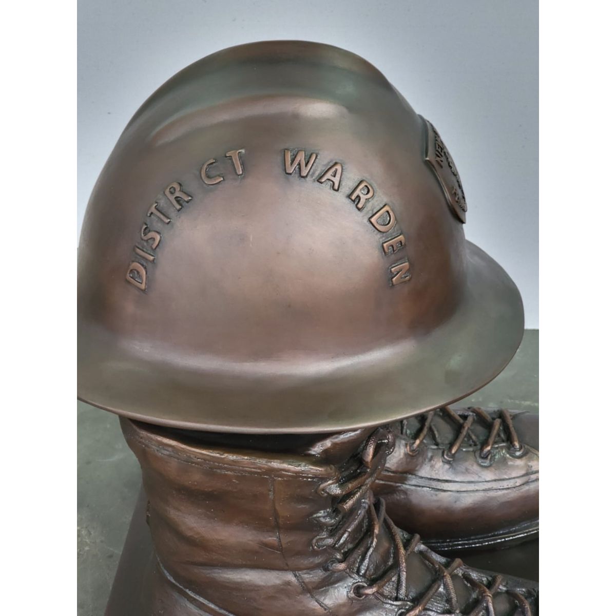 Custom Bronze Fireman Helmet & Boots Statue | Randolph Rose Collection